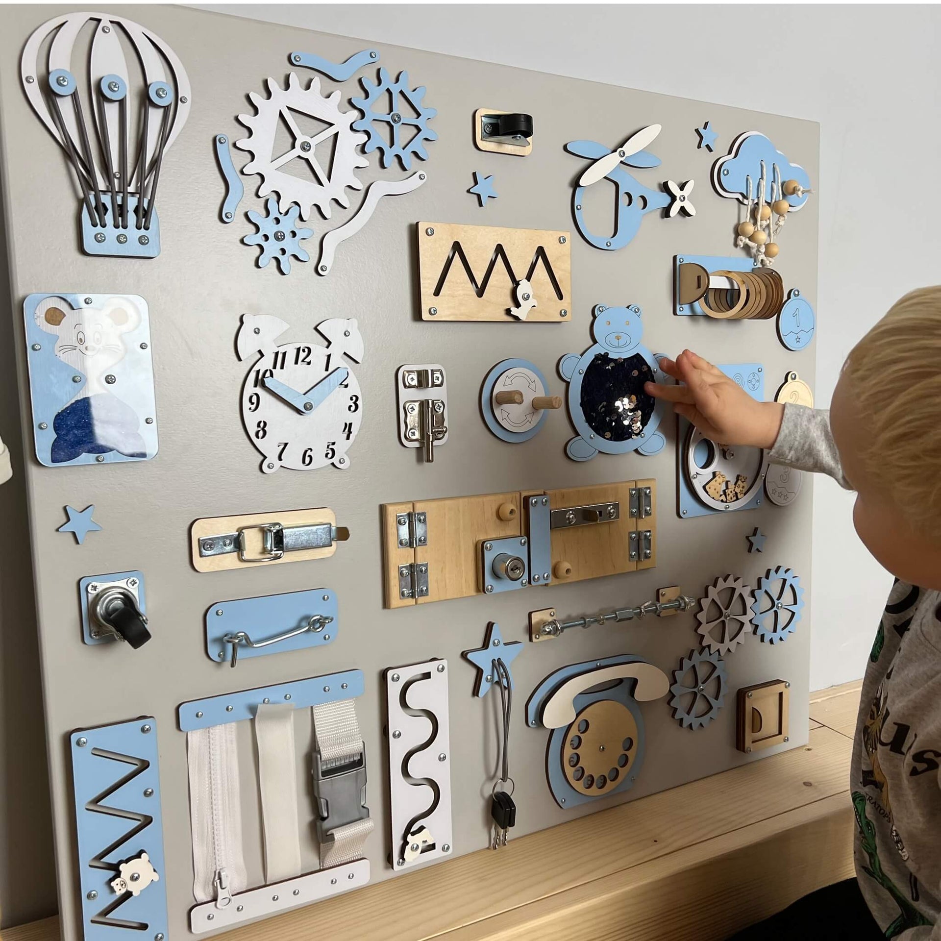 Wall-Mounted Sensory Adventure: Blue Busy Board Packed with Activities ...